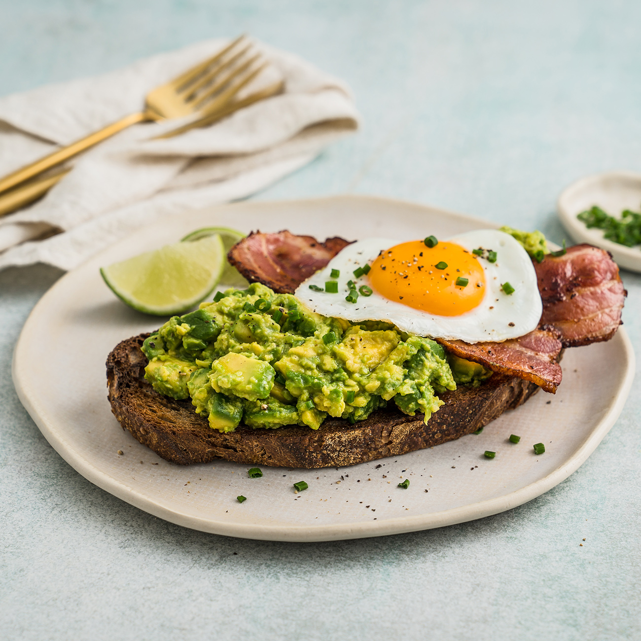 Egg & Bacon Smashed Avocado Toast Recipe | Woolworths Egg & Bacon Smashed Avocado Toast Recipe | Woolworths